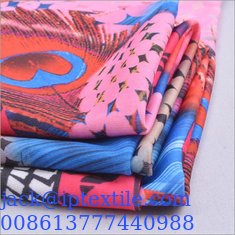 China Rusha Textile  Polyester FDY Spandex Imitation Digital Printing Peacock Fabric Prints supplier